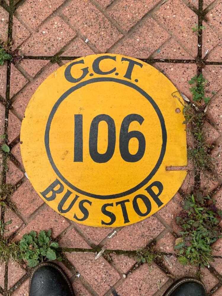 DOUBLE SIDED ROUND BUS STOP SIGN
